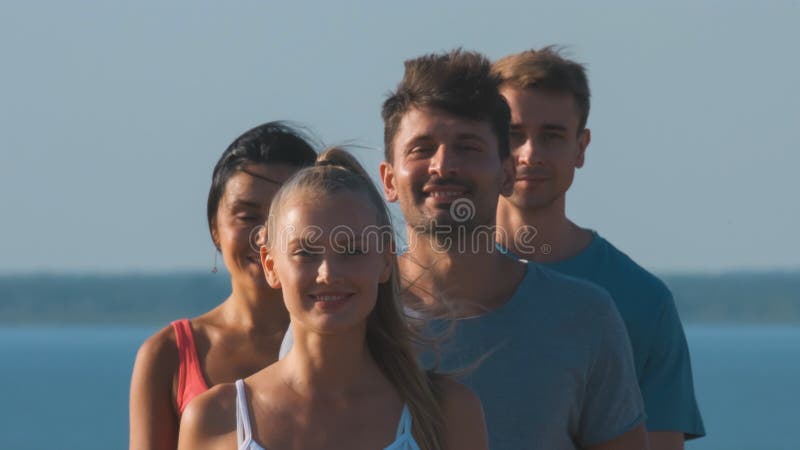 The Four Young People Standing One by One. Stock Image - Image of ...