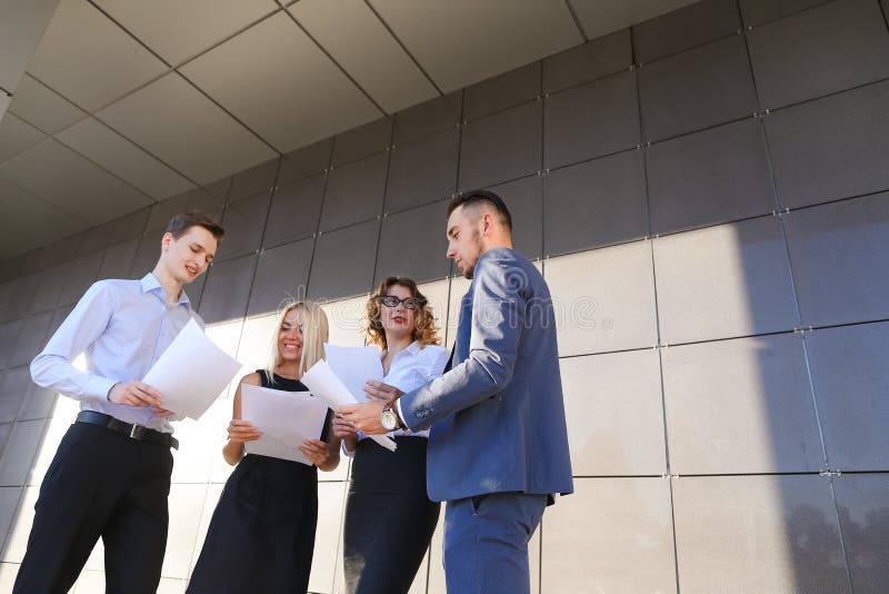 Four Young People, Two Men and Two Women, Students, Communicate, Stock ...