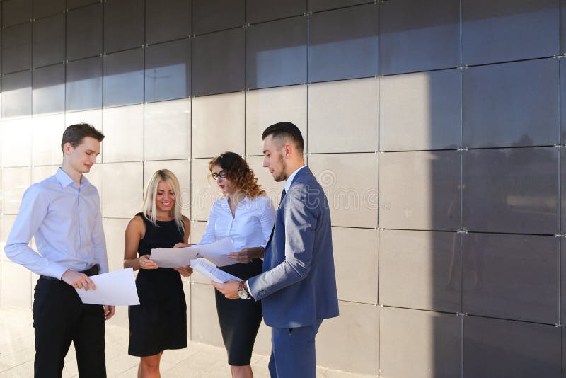 Four Young People, Two Men and Two Women, Students, Communicate, Stock ...