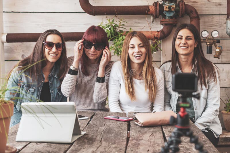 Four Young Vloggers Talking on the Camera Stock Photo - Image of ...