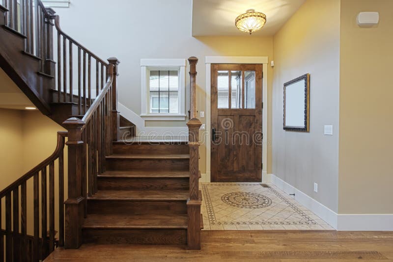 Entry Hall Stairs and Front Door Stock Photo - Image of stair, hallway ...