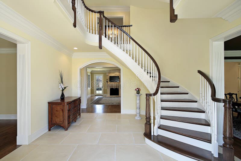 Foyer with Curved Staircase Stock Photo - Image of design, suburban ...
