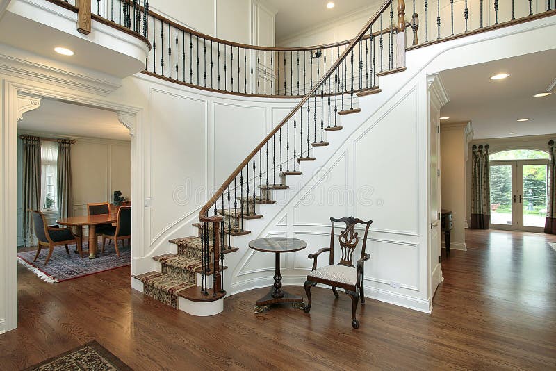 Foyer with Curved Staircase Stock Photo - Image of design, suburban ...