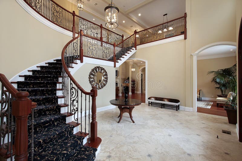 Foyer with Spiral Staircase Stock Photo - Image of residence, stairway ...