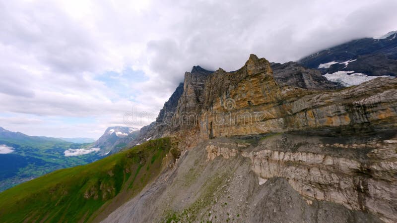 FPV Flight Diving Down West Flank of the EIGER Switzerland Grindelwald ...