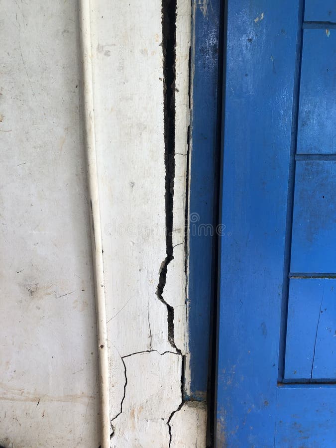 Fractured and Facade of a Wall Stock Image - Image of eroded, ground ...