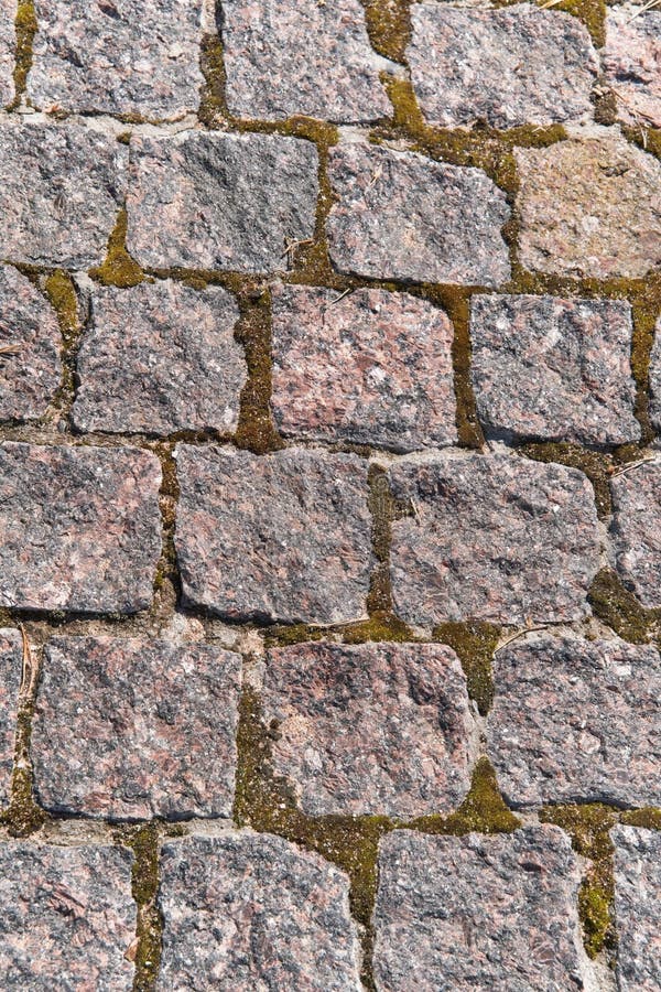 A Fragment of an Ancient Pavement Made of Granite Blocks. Stock Photo ...