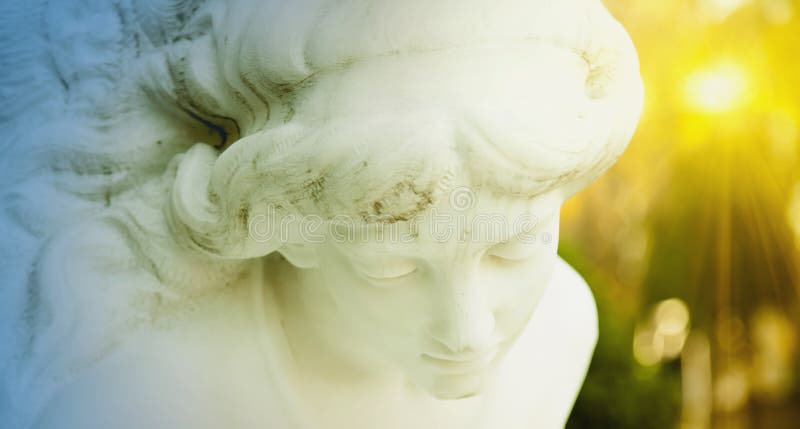 Beautiful White Guardian Angel in Sun Rays. Ancient Stone Statue Stock ...