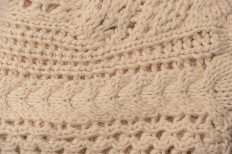 A Fragment of Beige Knitted Fabric, Knitted from White Sheep Wool Stock ...