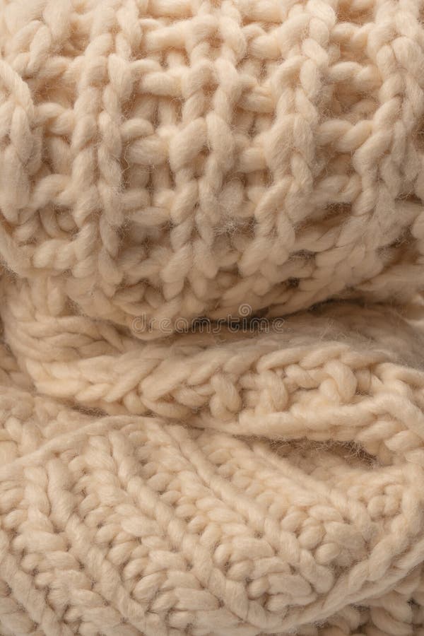 A Fragment of Beige Knitted Fabric, Knitted from White Sheep Wool Stock ...