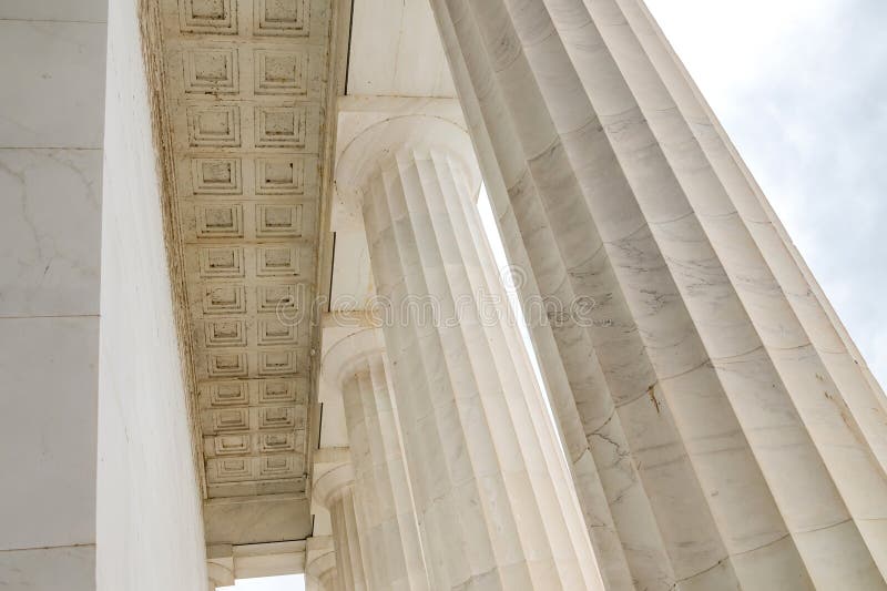 Fragment of the Building with Elegant White Columns. View from Below ...