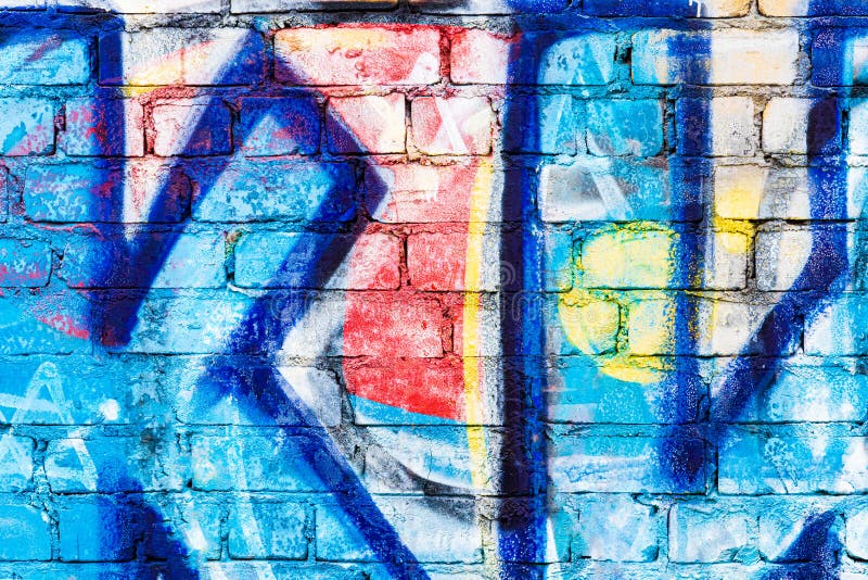 A Fragment of Colorful Graffiti Painted on a Brick Wall. Abstract ...