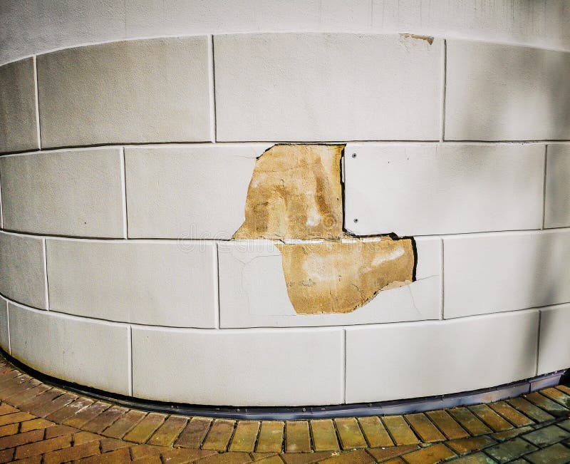 A Fragment of Crumbling Tiles on the Facade of a Historic Building ...