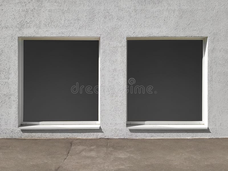 A Fragment of the Facade of a Building with Two Display Windows on the ...