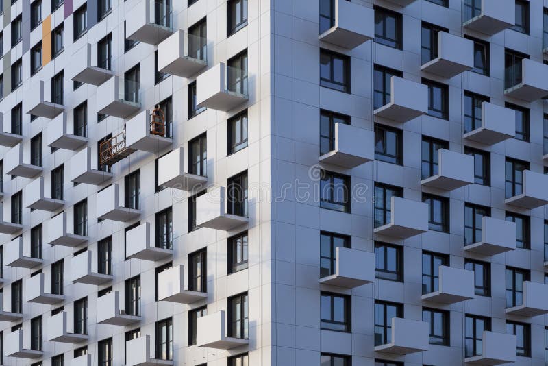 Fragment of the Facade of a Multi-storey Building with the Same Type of ...