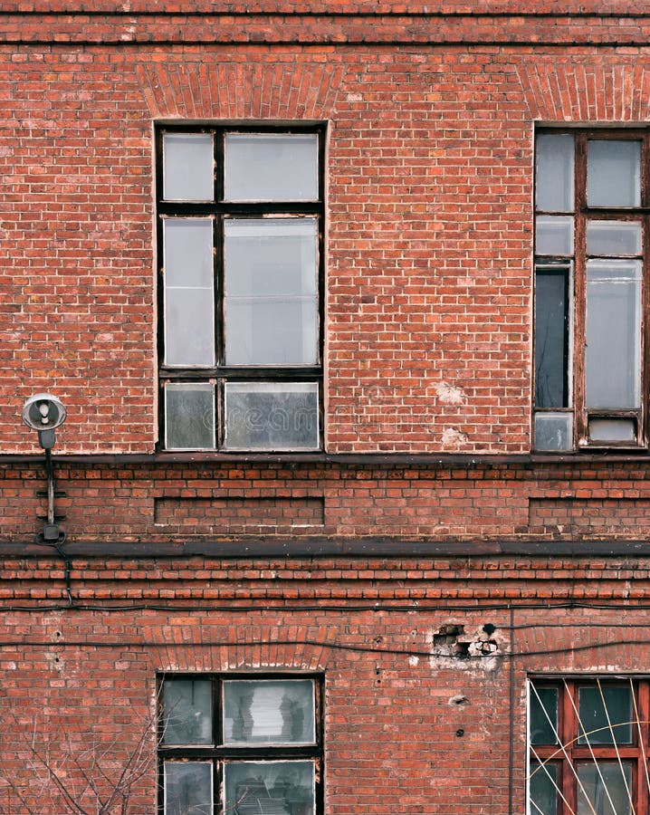 Facade of an Old Brick Building in Loft Style. High Windows and ...