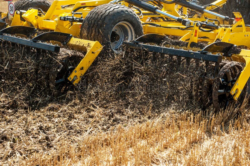 Fragment of a Heavy Disc Harrow in Work Stock Photo - Image of ...