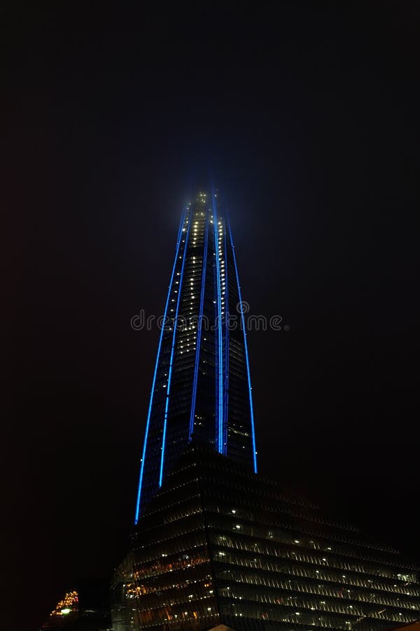 Fragment of a High-rise Building with Illumination, Going into the ...