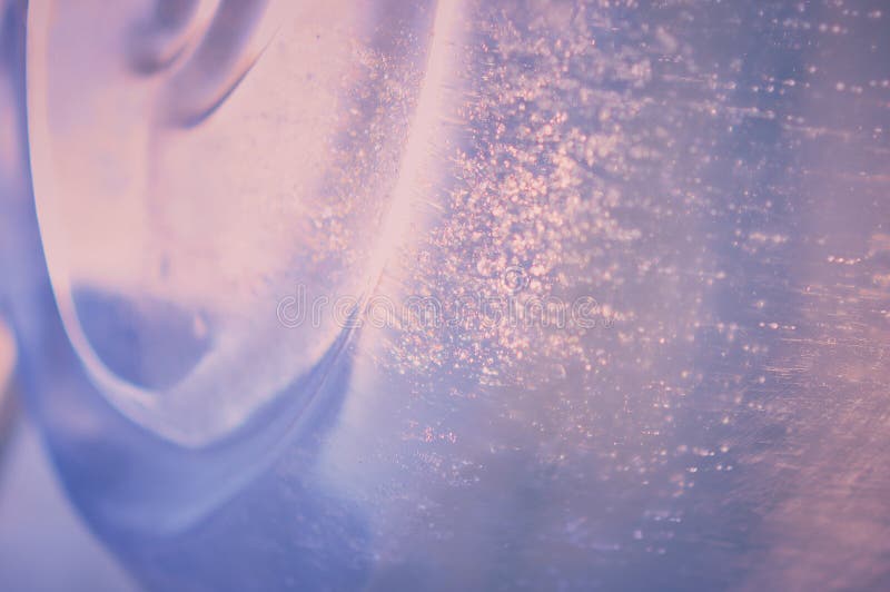 Fragment of an Ice Figure in the Rays of the Sun. Focus Inside the ...