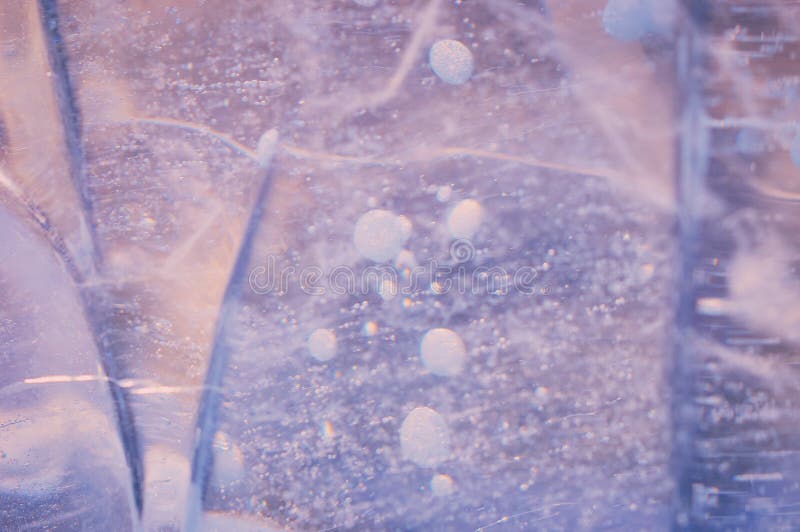 Fragment of an Ice Figure in the Rays of the Sun. Focus Inside the ...