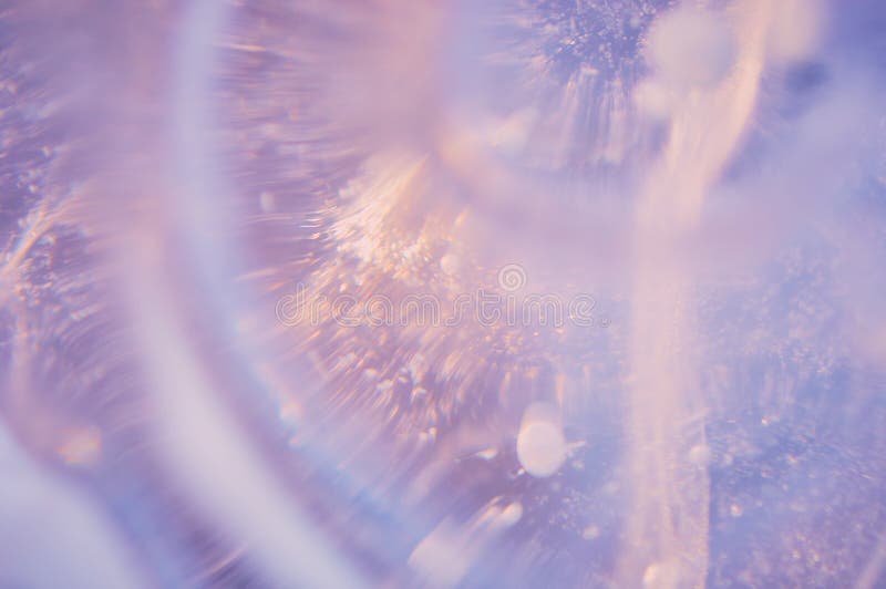 Fragment of an Ice Figure in the Rays of the Sun. Focus Inside the ...