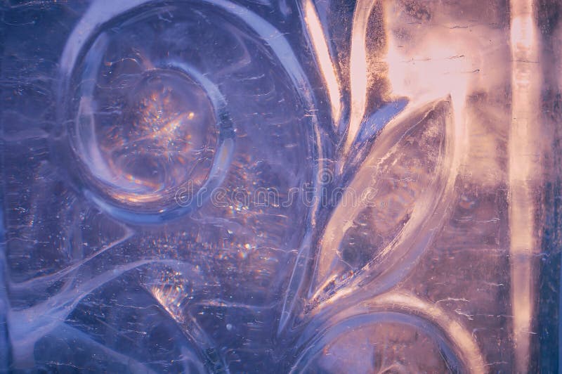 Fragment of an Ice Figure in the Rays of the Sun. Focus Inside the ...