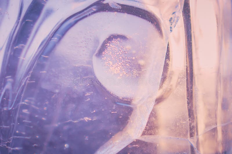 Fragment of an Ice Figure in the Rays of the Sun. Focus Inside the ...