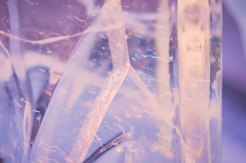 Fragment of an Ice Figure in the Rays of the Sun. Focus Inside the ...