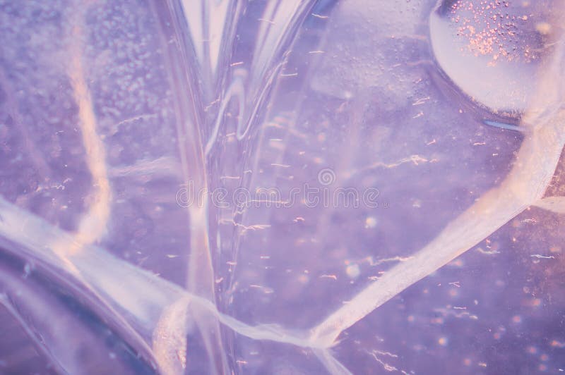 Fragment of an Ice Figure in the Rays of the Sun. Focus Inside the ...