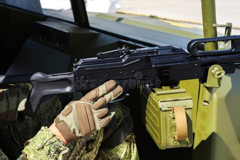 Fragment of a Machine Gun with Ammunition during the Fighting. a Hand ...
