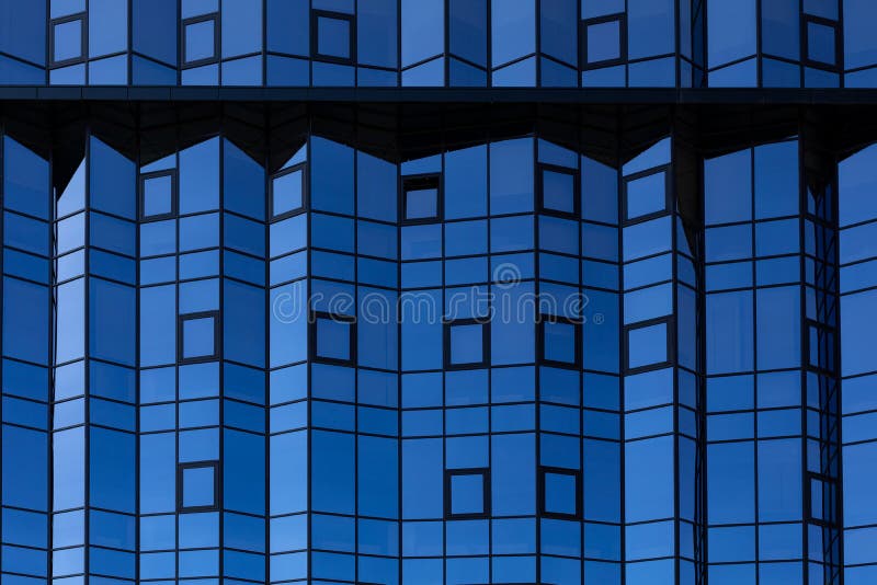 Mirrored Facade of Building with Small Square Windows. Glazing of ...