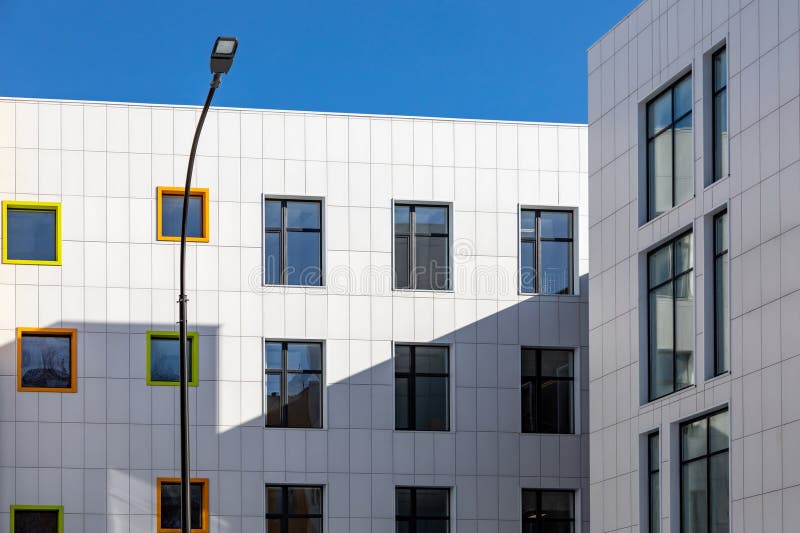 A Fragment of an Office Building with White Walls and Windows of ...