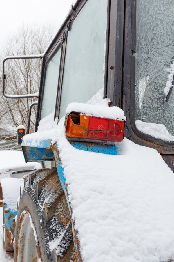 Fragment of the Old Tractor Cab Covered with Snow. Rear View Stock ...