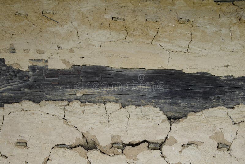 A Fragment of the Old Wall of a Log House with Clay-covered Cracks ...