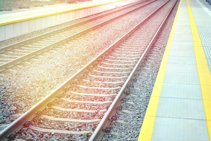 Fragment of the Platform and Railroad Tracks in Sunlight. Stock Photo ...