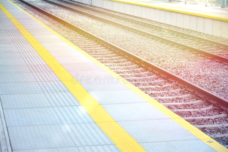 Fragment of the Platform and Railroad Tracks in Sunlight. Stock Image ...