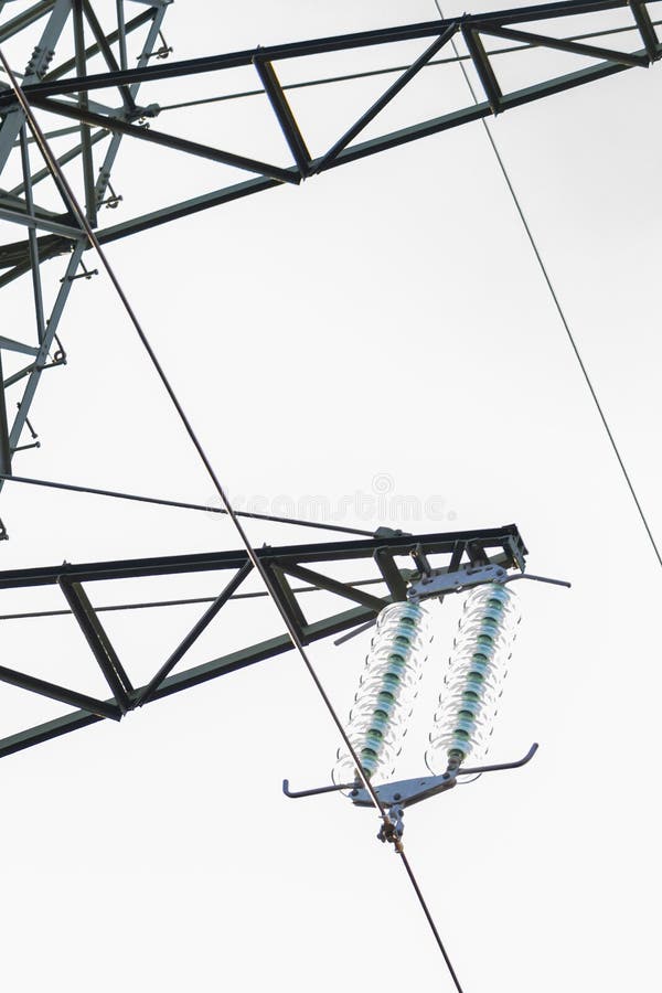 A Fragment of a Power Line on a Light Background. Concept: Transmission ...