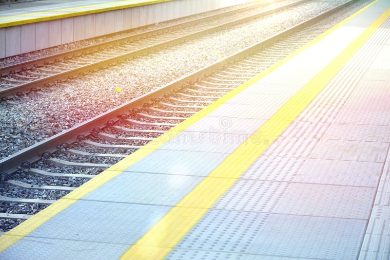 Fragment of the Platform and Railroad Tracks in Sunlight. Stock Photo ...