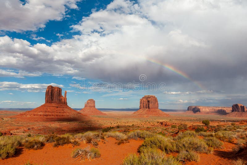 A Rainbow Over Monument Valley Stock Photo - Image of background, cloud ...