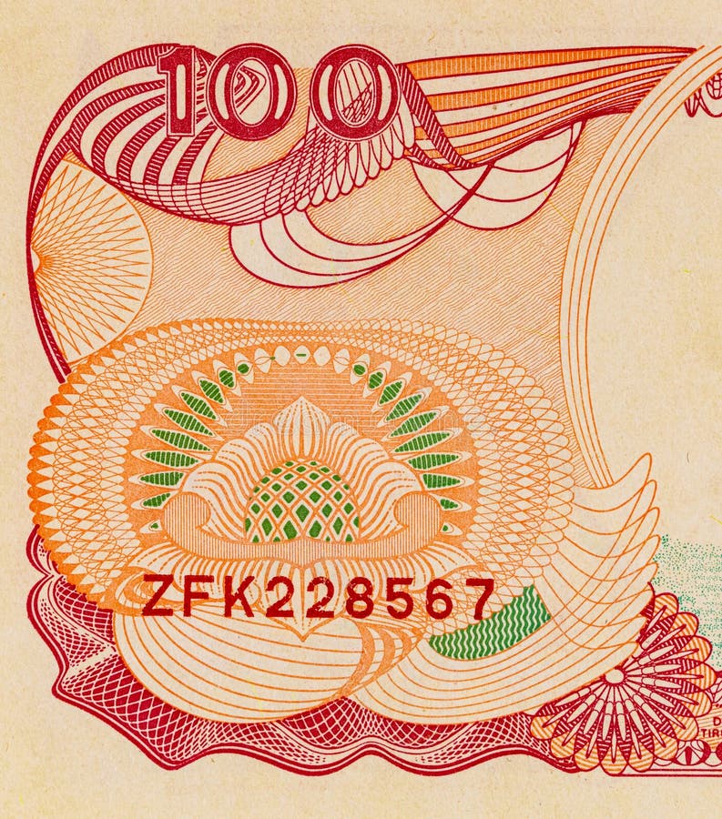 Fragment of a 100 Rupiah Banknote Indonesia. Paper Money of Indonesia ...