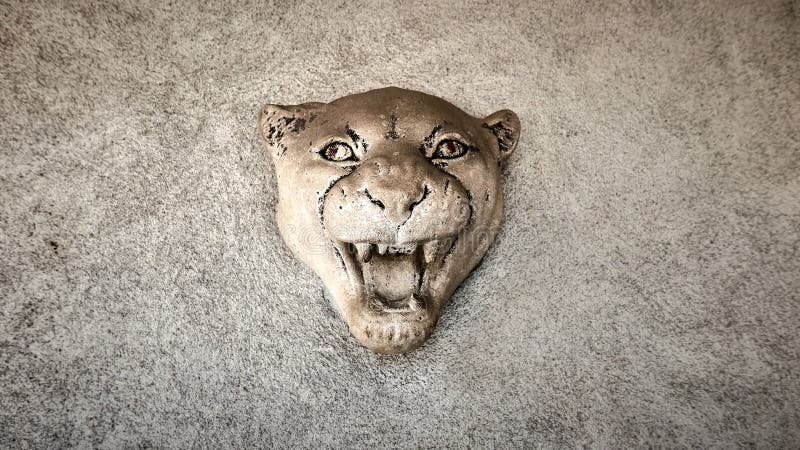 Fragment of a Sculpture of a Leopard Head on a Concrete Wall, Sculpture ...