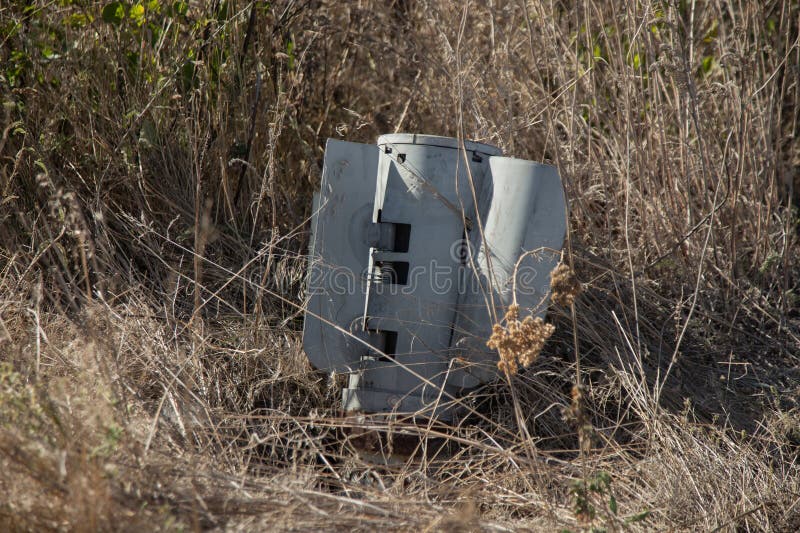 Fragment from a Shell in the Field, the Consequences of Shelling. Stock ...