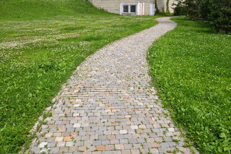 Fragment of a Stone Path among the Grass Stock Image - Image of pavers ...
