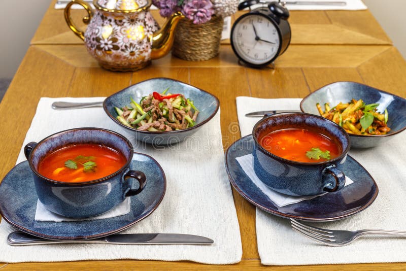 A Fragment of the Table Setting in a Restaurant or Cafe. Salad, First ...