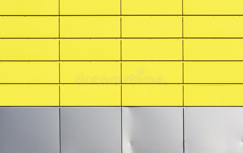 Fragment of a Yellow Iron Wall Made of Rectangular Blocks Stock Photo ...