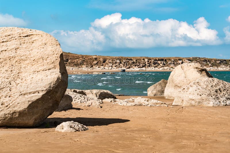 Fragments of Ancient Rocks on Sea Coast. Summer Rest on Beach Stock ...