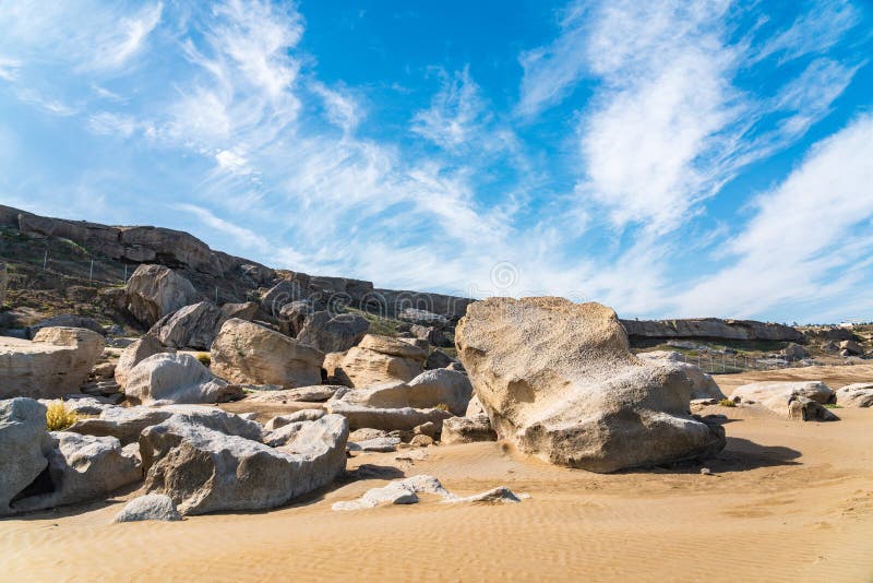 Fragments of Huge Ancient Rocks on Sandy Beach Stock Image - Image of ...