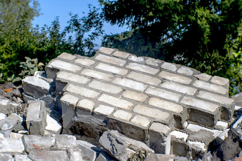 Fragments of a Wall of a Gray Brick at Utilization of a Brick Building ...