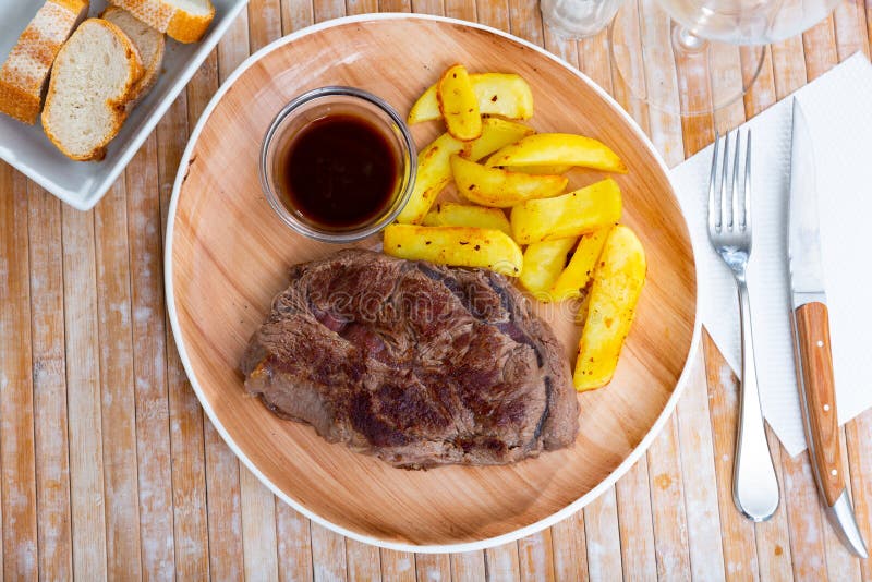 Fried Beef Fillet with Potatoes and Sauce Stock Photo - Image of ...