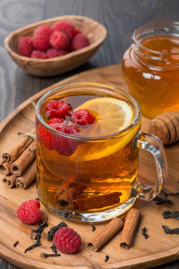 Fragrant Black Tea with Lemon, Raspberry and Cinnamon Stock Image ...
